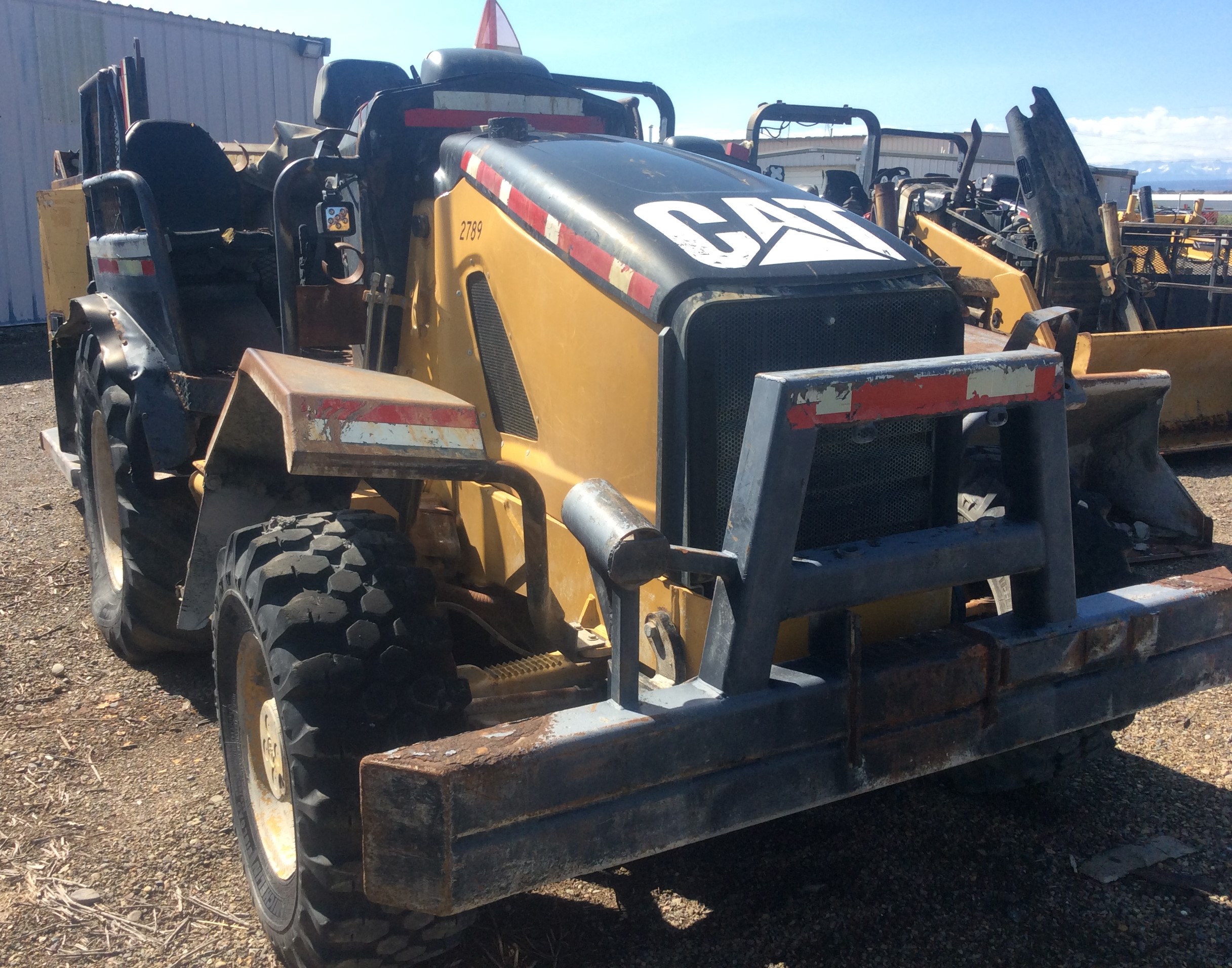 Caterpillar 414E Tractor - Mining Equipment & Supply LLC